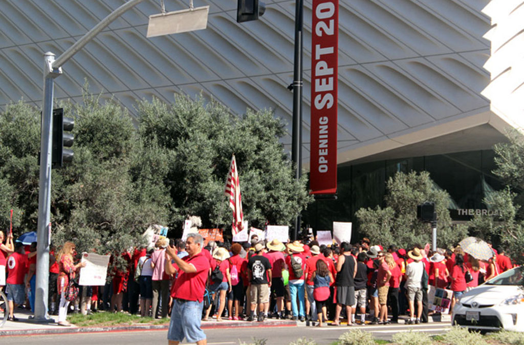 Charter school opponents protest museum opening over founder’s ...